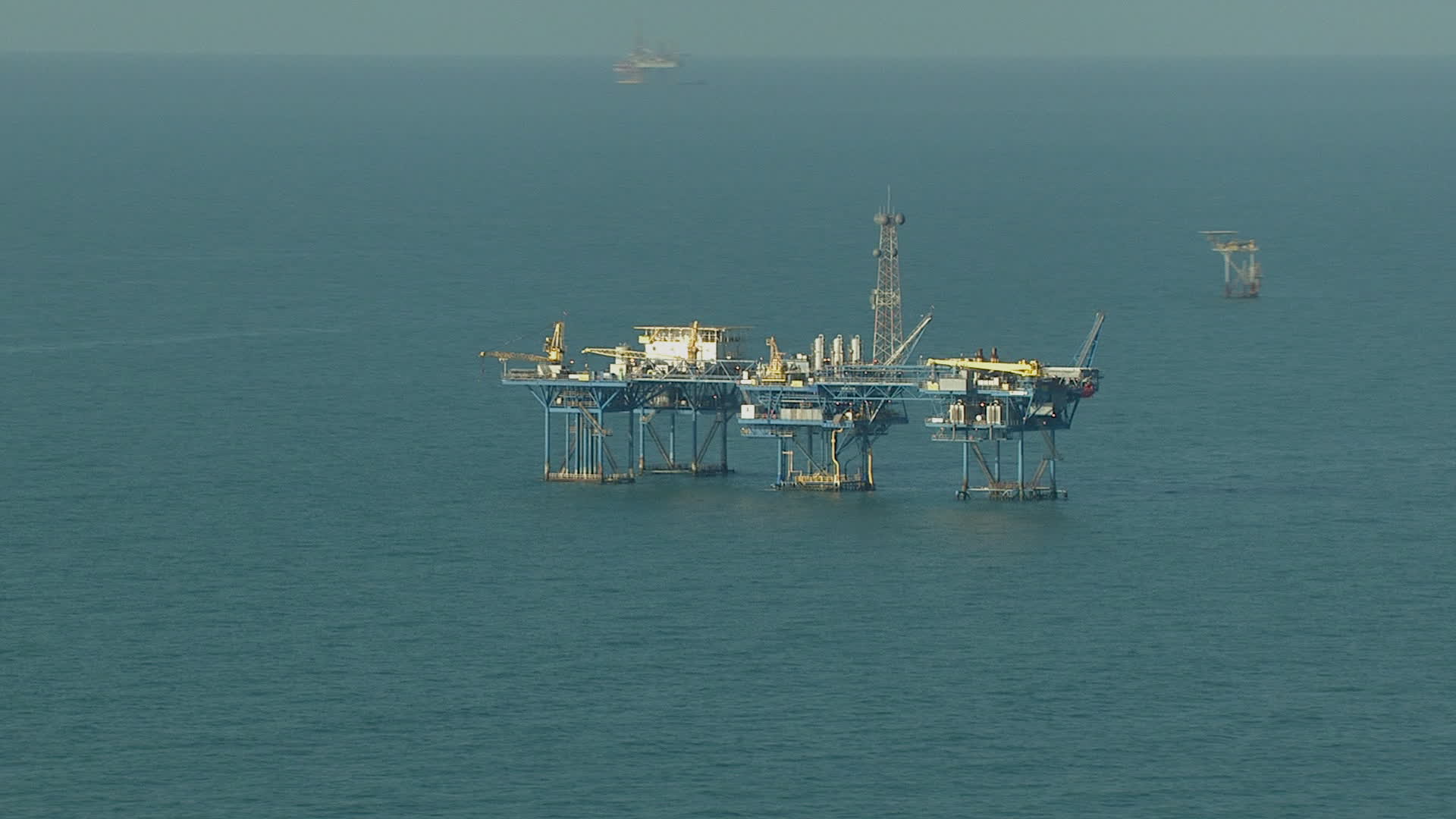 HD stock footage aerial video of a large oil platform in the Gulf of ...