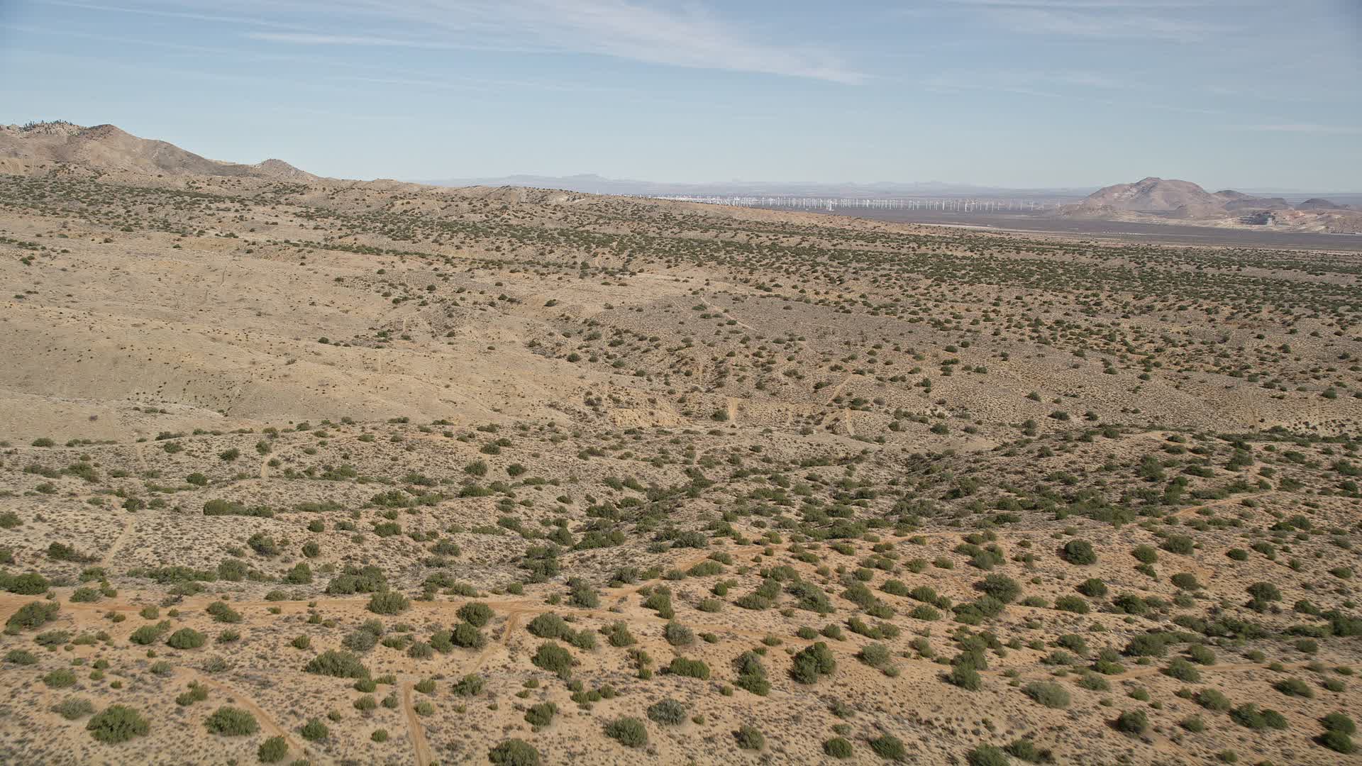 5K stock footage aerial video of flying low over open desert in ...