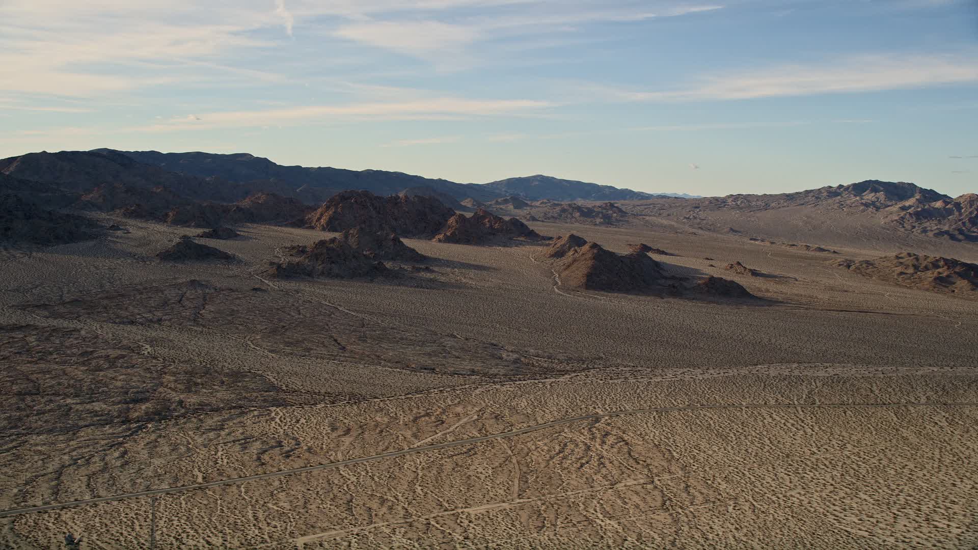 5K stock footage aerial video of mountains and open desert, Mojave ...