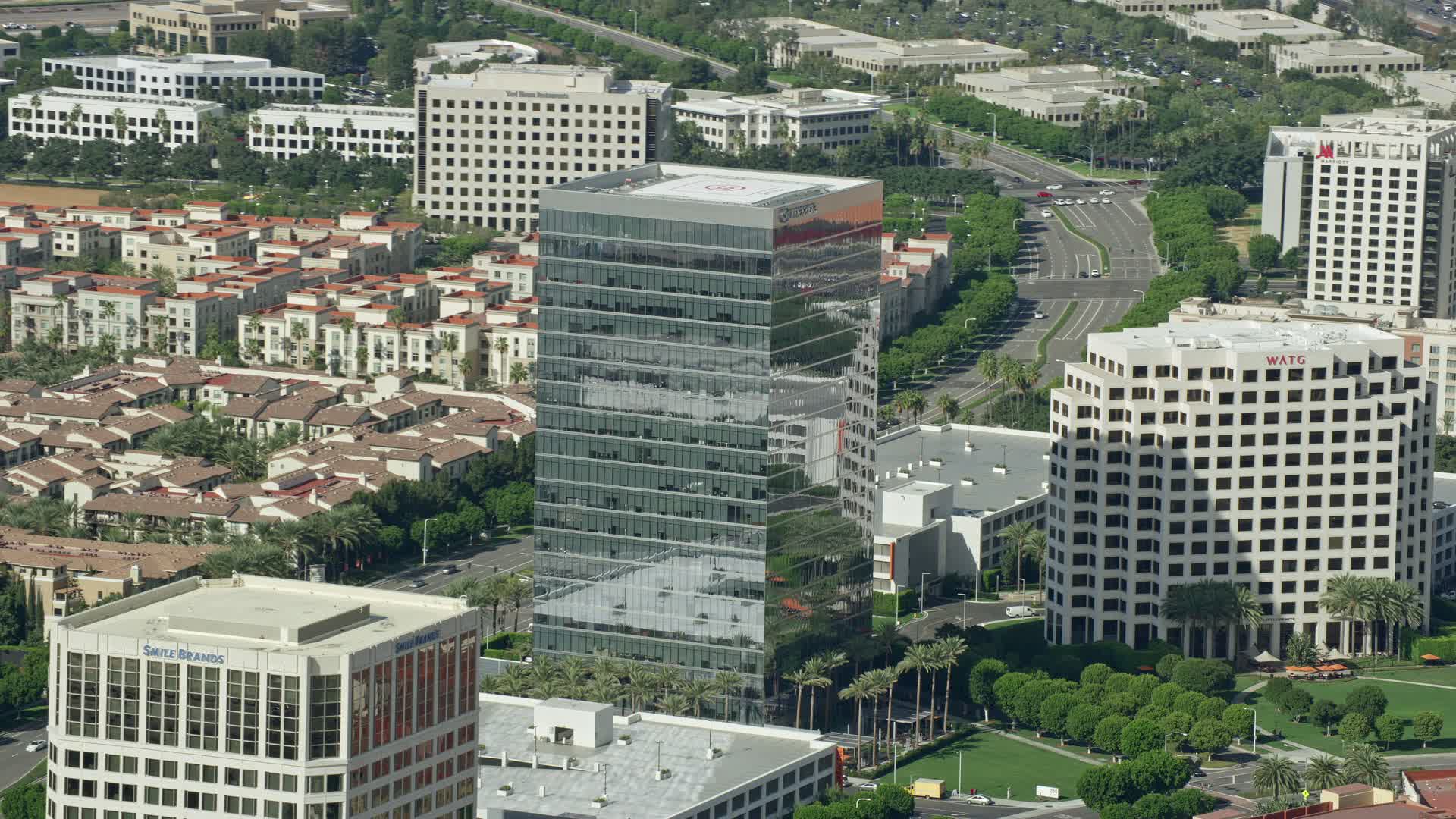 7.6K stock footage aerial video orbiting an office building at Irvine ...