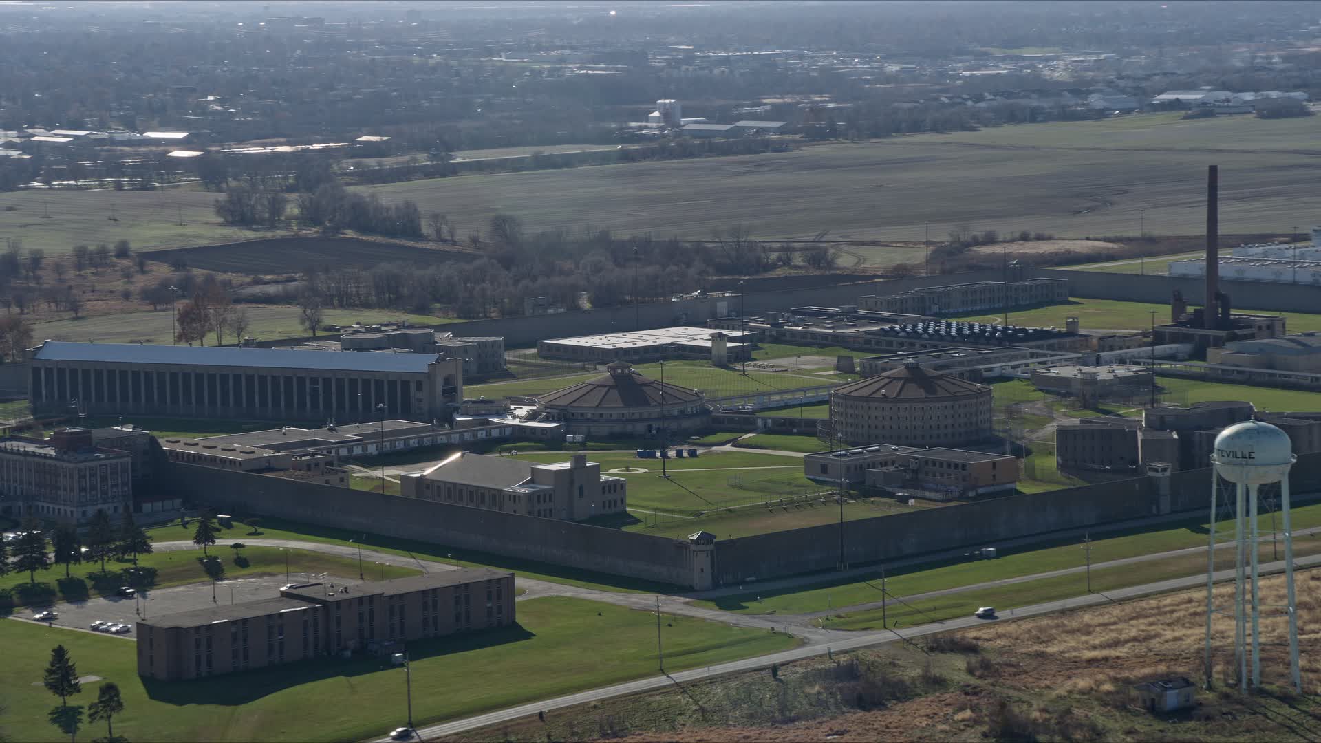4K stock footage aerial video orbit the Stateville Correctional Center ...