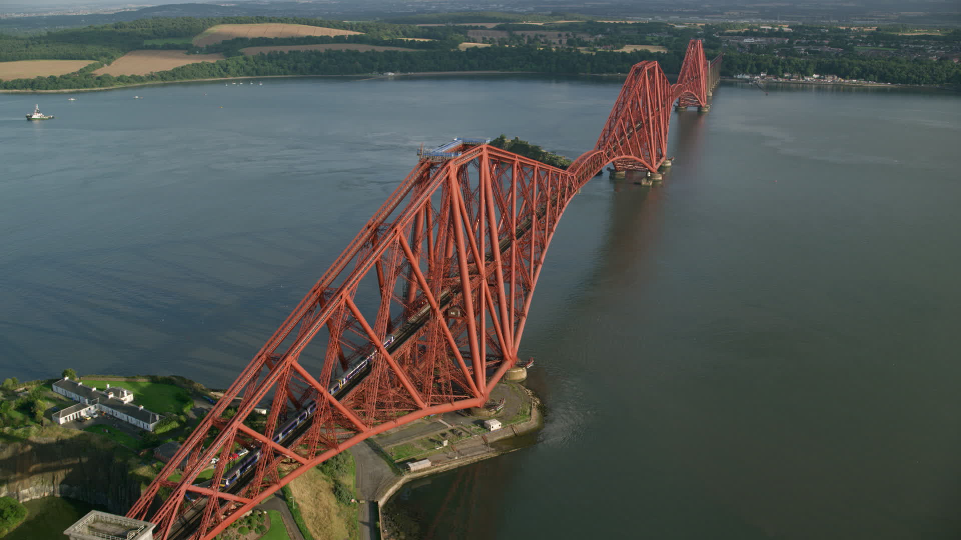 5.5K stock footage aerial video of tracking a train crossing Forth Bridge over Firth of Forth ...