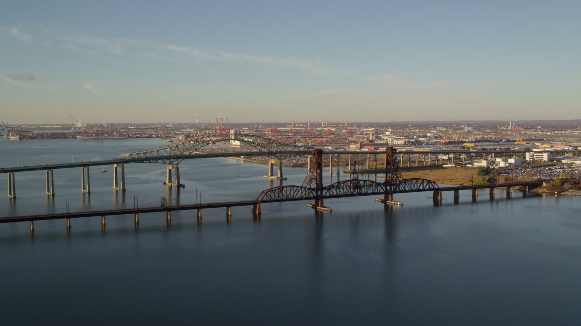 6K stock footage aerial video of an orbit of the Newark Bay Bridge and ...