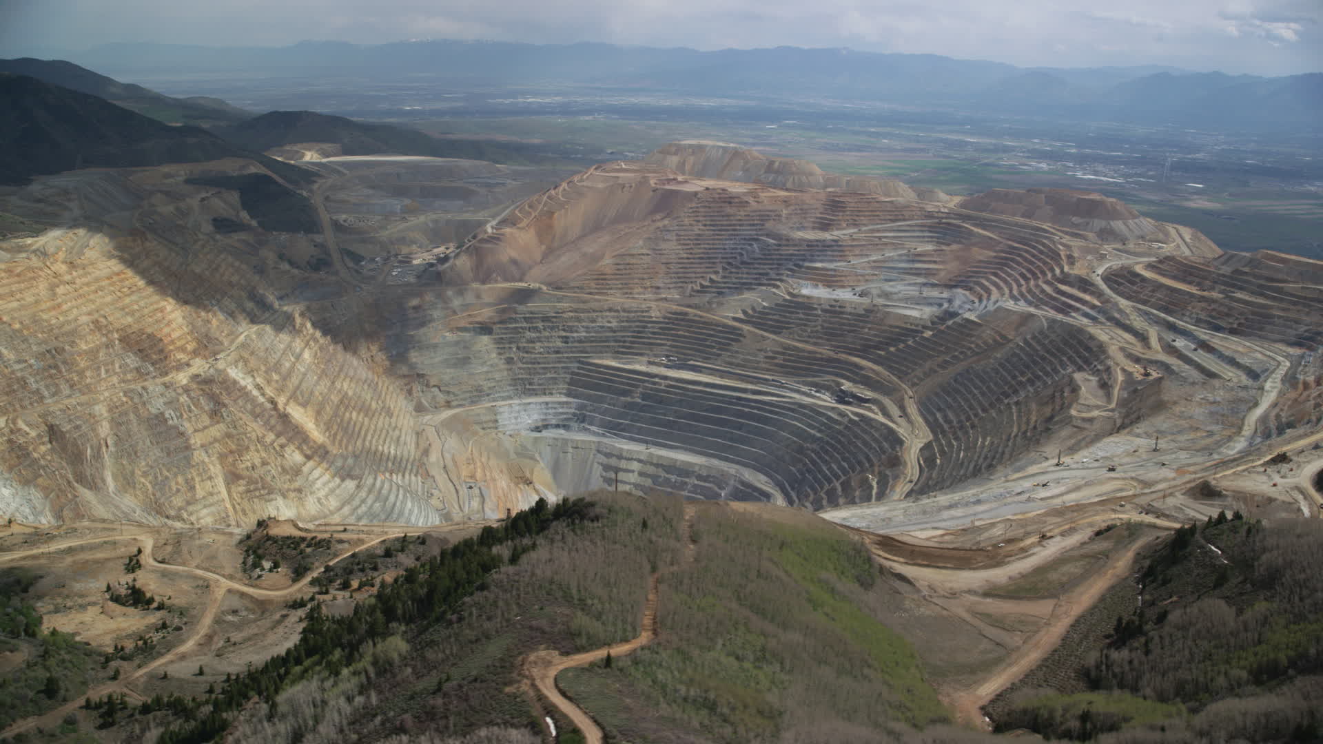 5.5K stock footage aerial video of circling around the Bingham Canyon ...