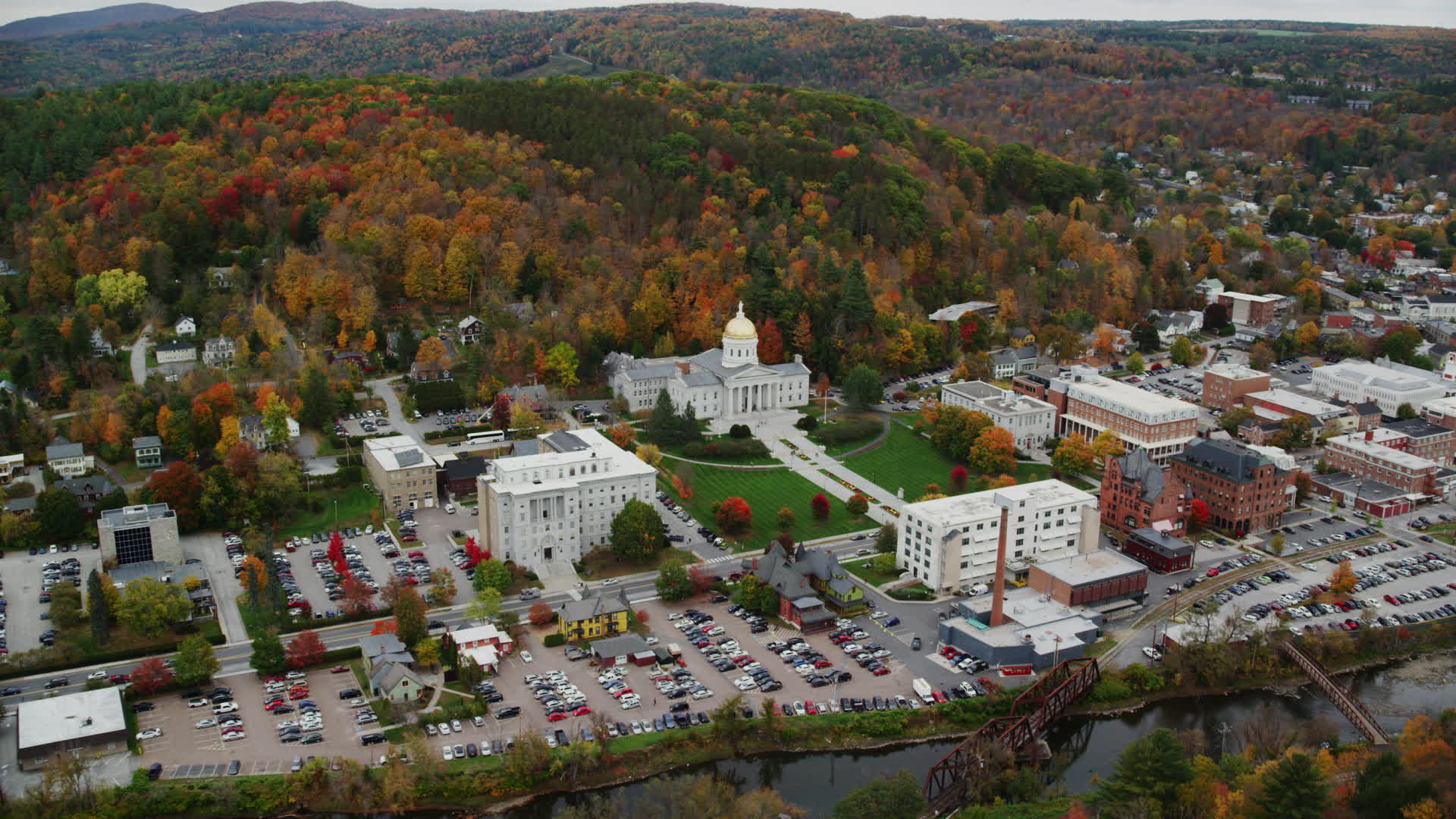 5.5K stock footage aerial video flying by downtown, Vermont State House ...