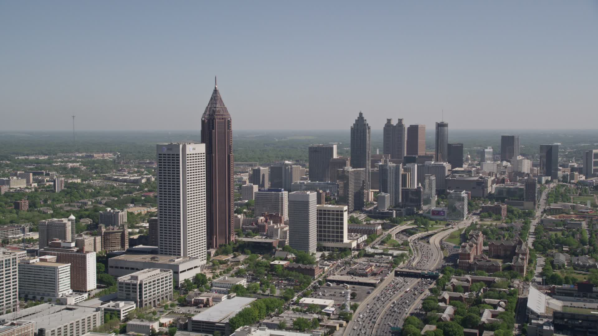 4.8K stock footage aerial video flying by Midtown Atlanta skyscrapers ...