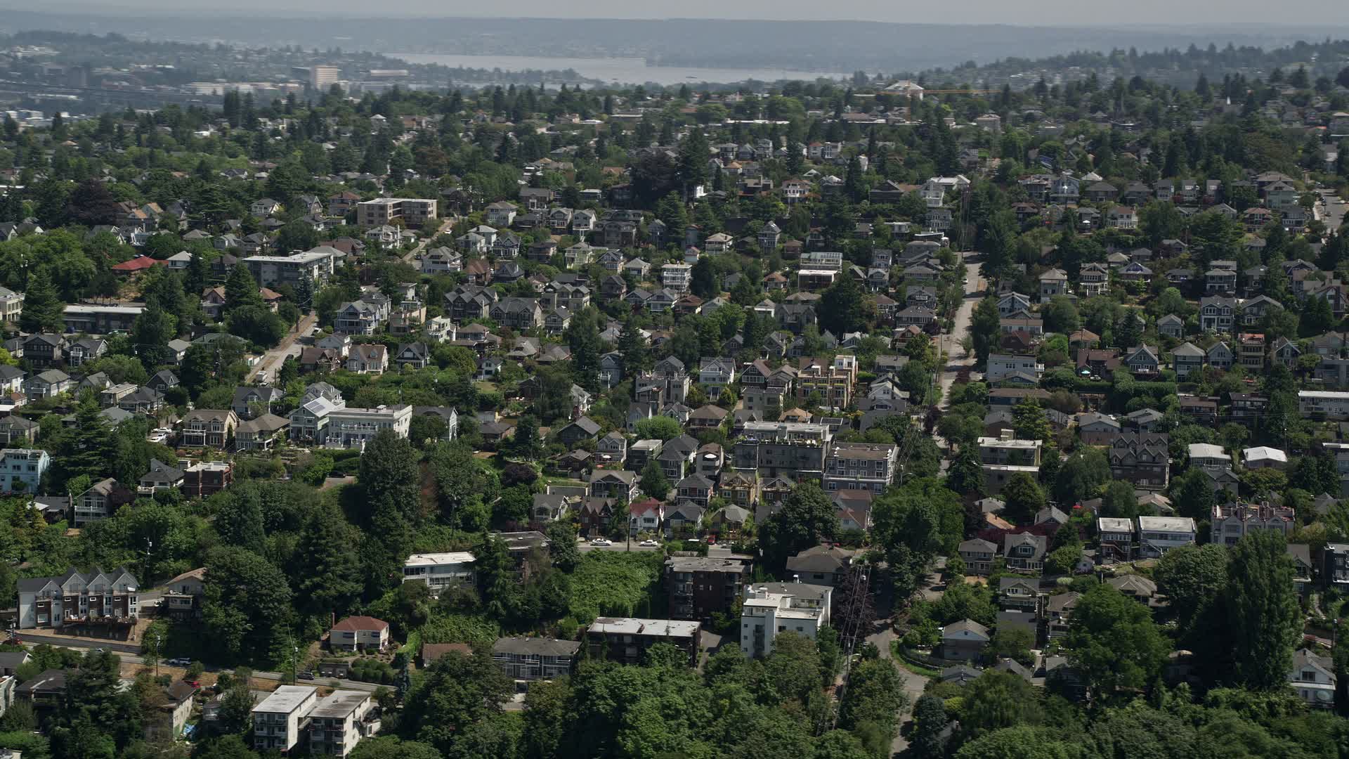 5K stock footage aerial video of flying by a suburban neighborhood in ...
