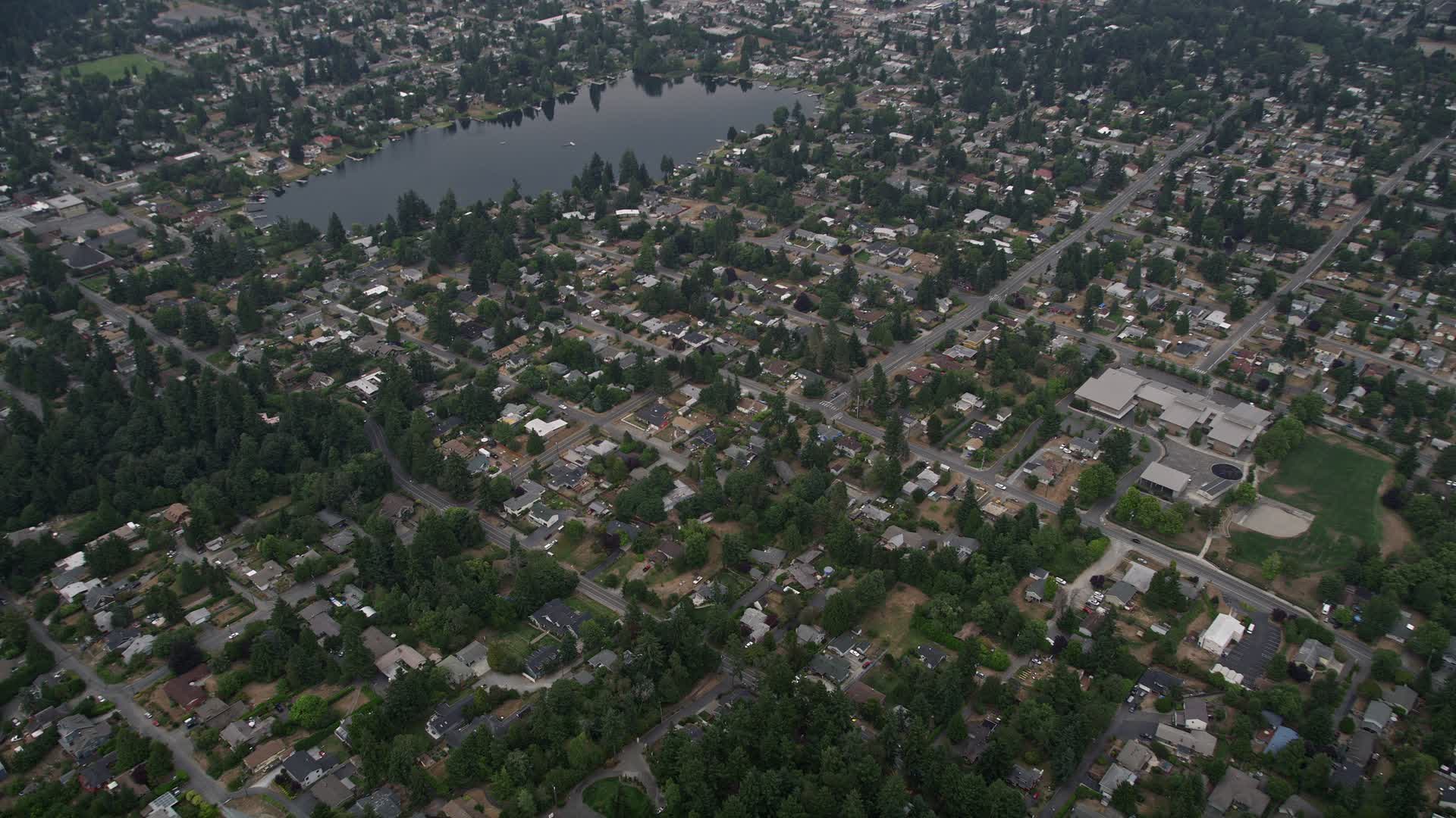 5K stock footage aerial video fly over and tilt to suburban homes near ...