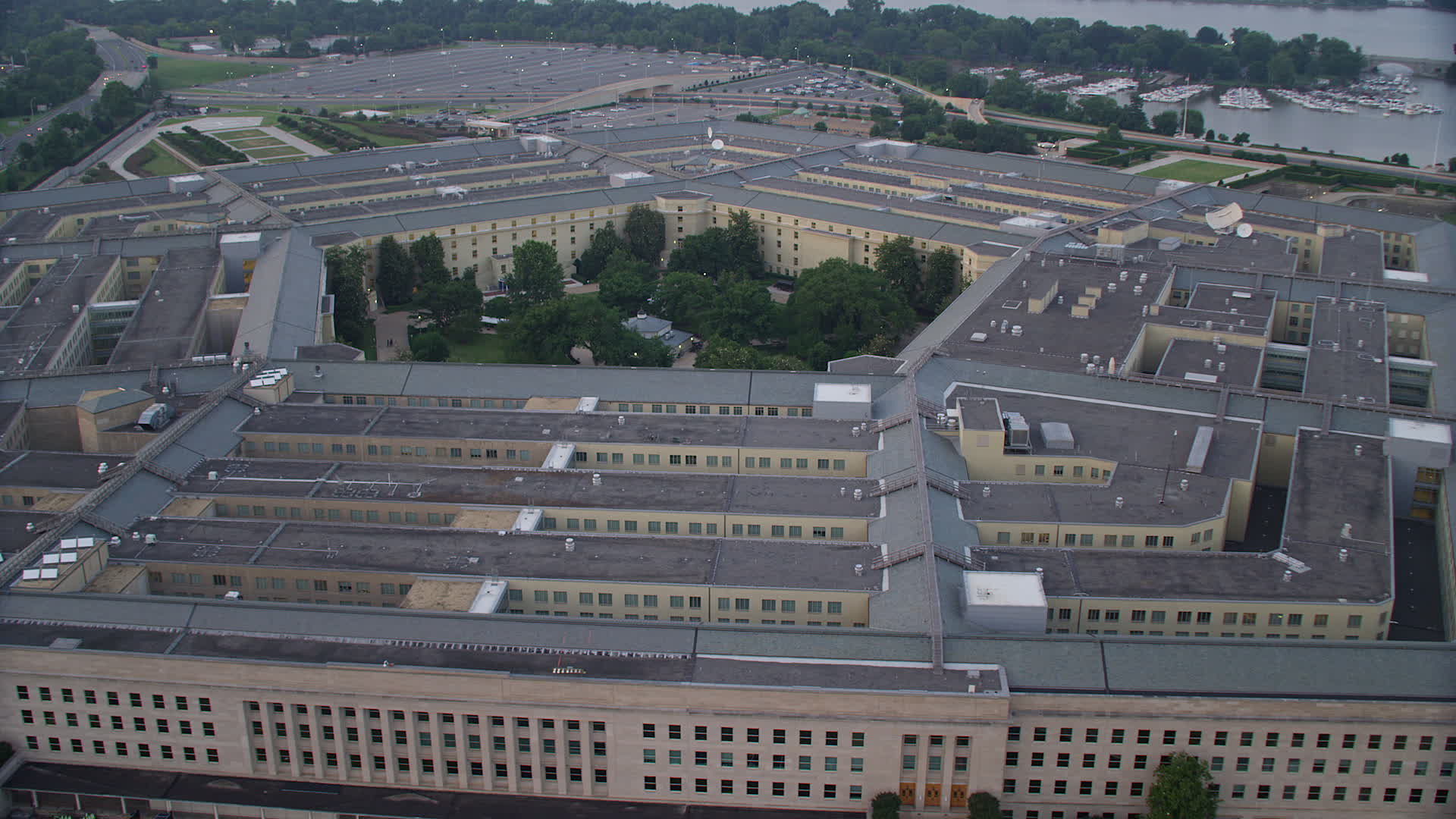 5K stock footage aerial video approaching The Pentagon Center Courtyard ...