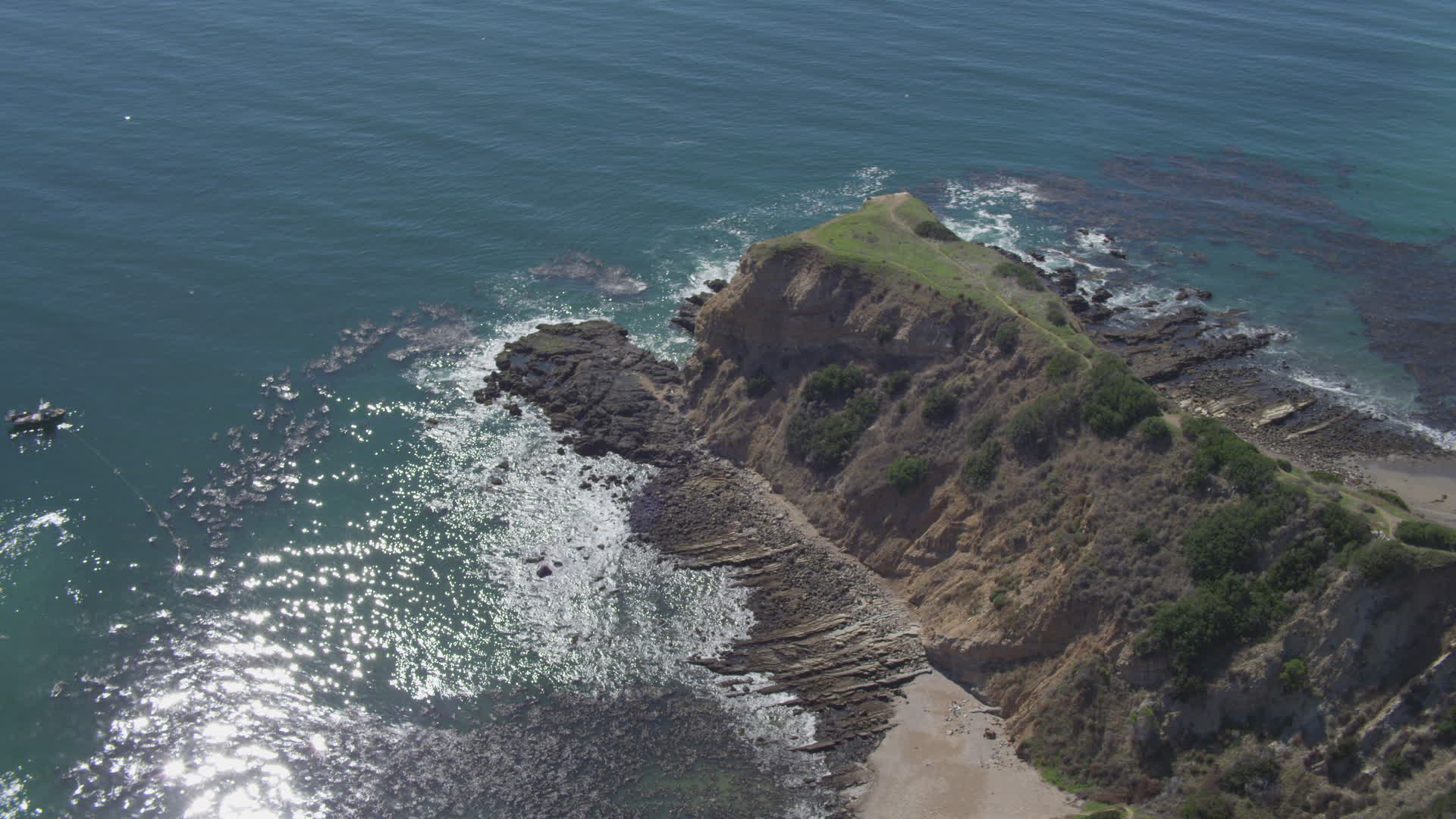 4K stock footage aerial video flyby coastal cliff to reveal small cove ...