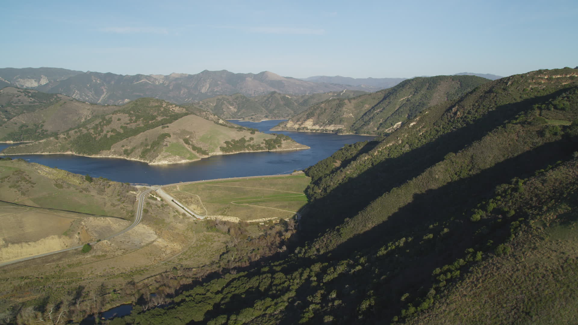 5K stock footage aerial video of flying by Lopez Lake and Lopez Dam ...