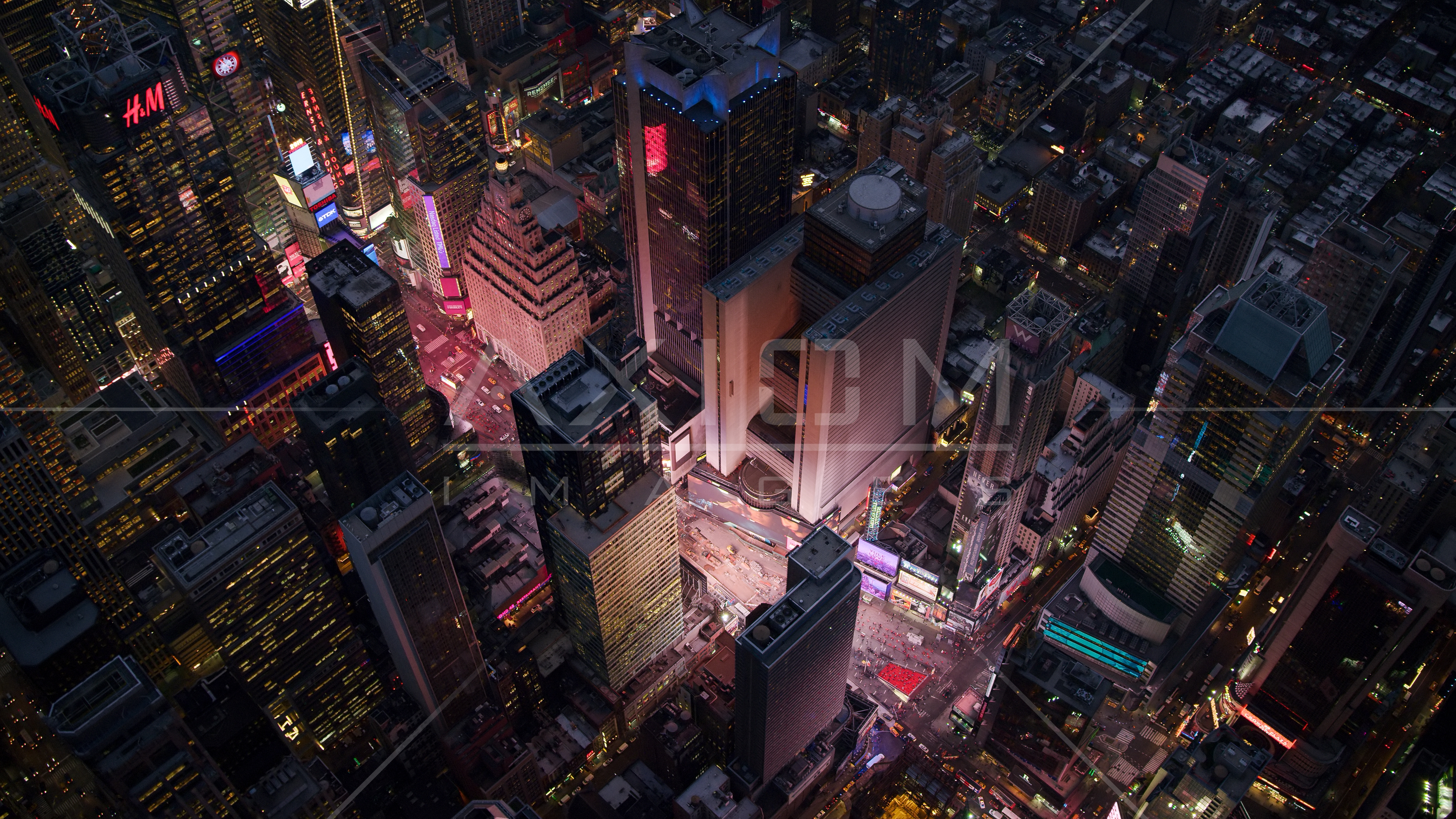 A bird's eye view of Times Square at sunset in Midtown, New York City ...