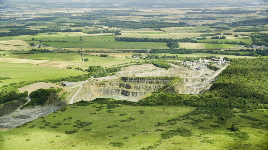 A quarry surrounded by farm fields, Denny, Scotland Aerial Stock Photo ...