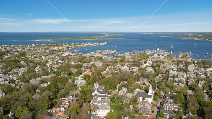 Oceanfront homes and Nantucket Harbor Lights, Nantucket, Massachusetts ...