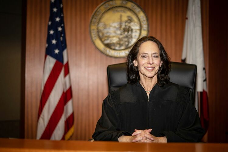 Judge Karen Moskowitz wants debtors, creditors to settle before trial
