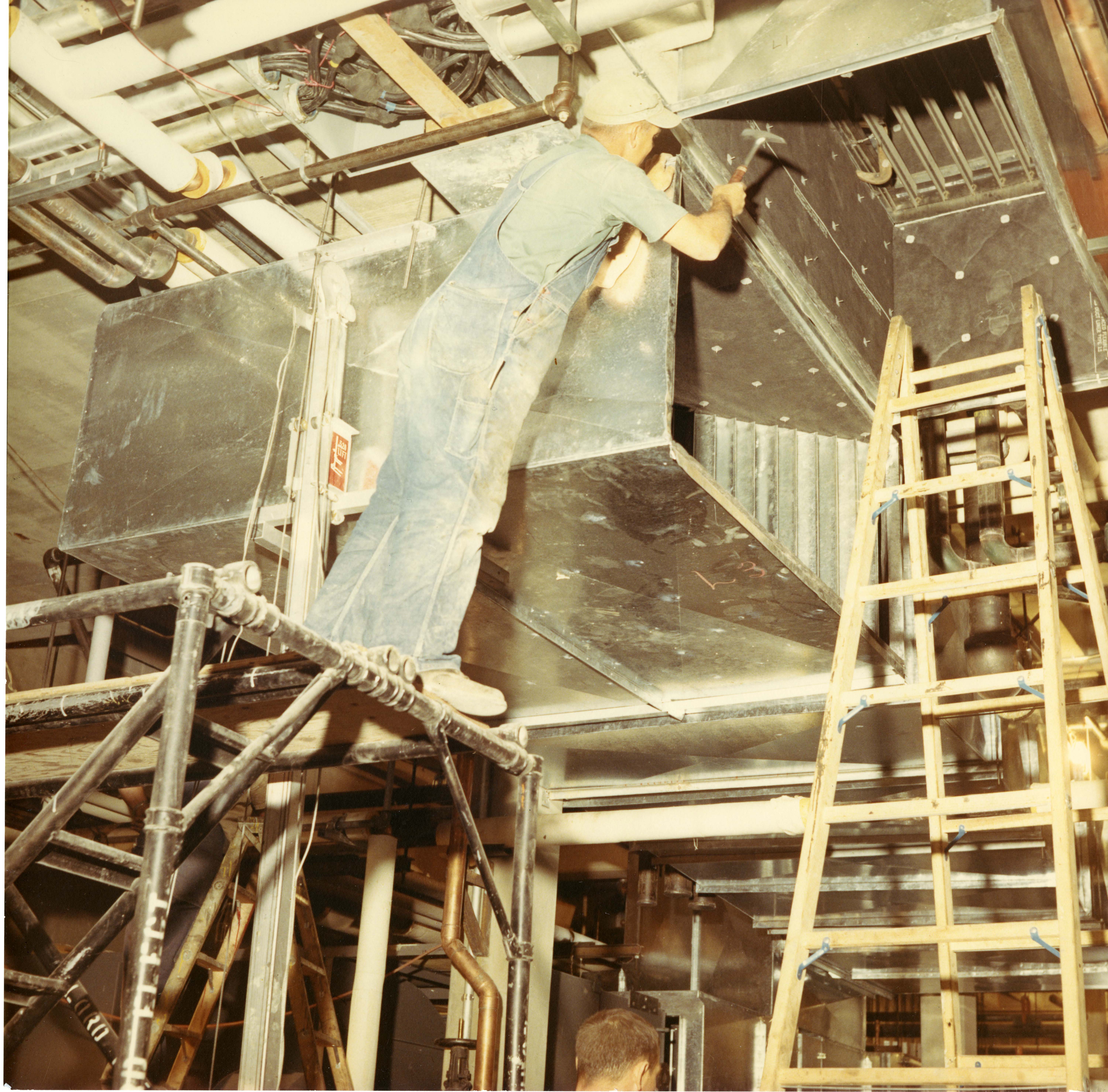 Man Using Hammer · Hanford History Project