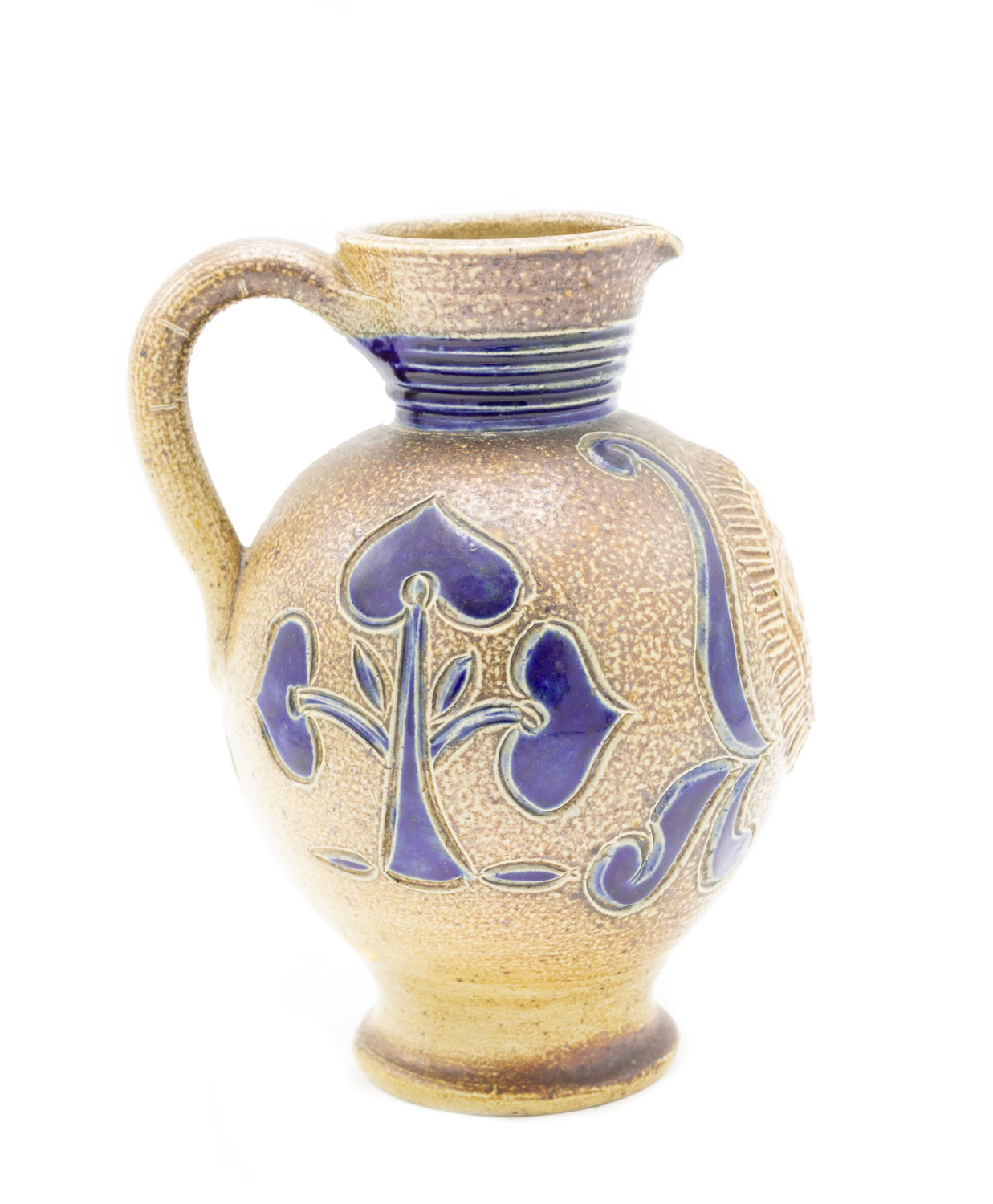 German stoneware pitcher with incised blue decorations
