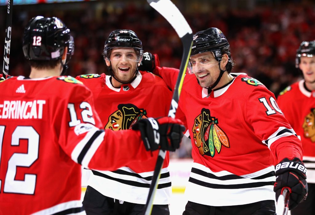 Emotional Patrick Sharp breaks through on Hockey Fights Cancer night ...